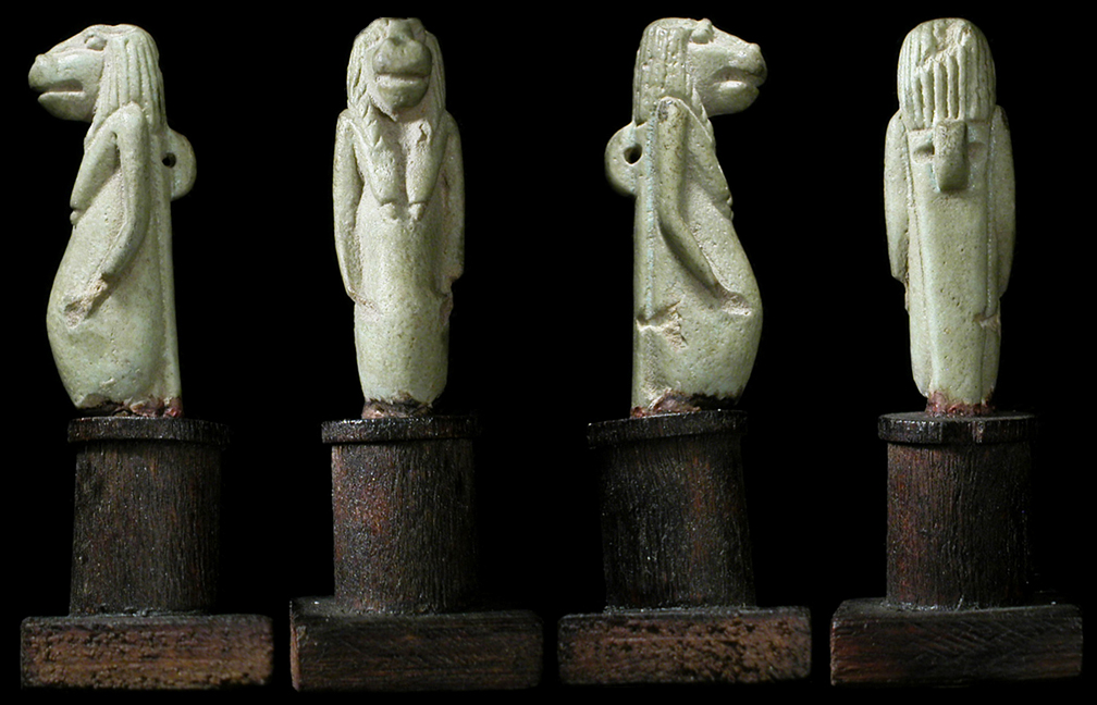 Egypt, Ptolemaic period, 332-30 BC. Faience amulet of a reclining lion ...